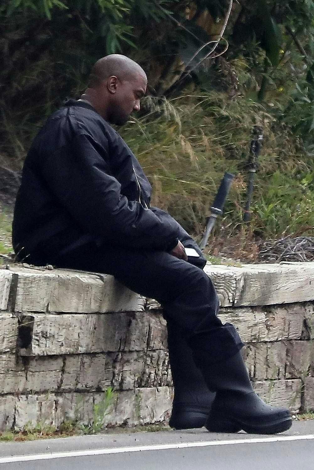 Kanye West Waits for Uber Driver's Car at Tadao Ando House in LA