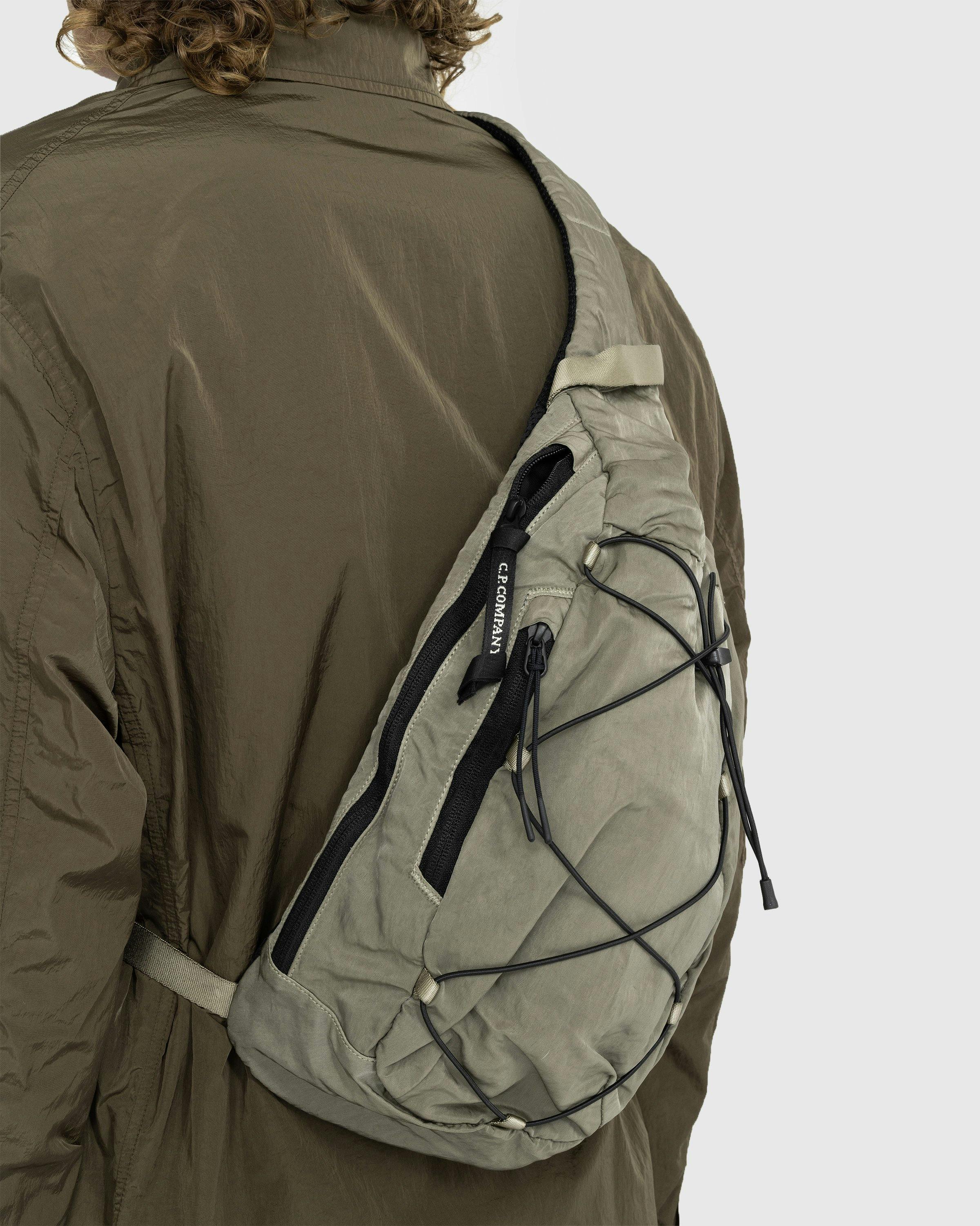 C.P. Company – Nylon B Crossbody Rucksack Silver Sage | Highsnobiety Shop
