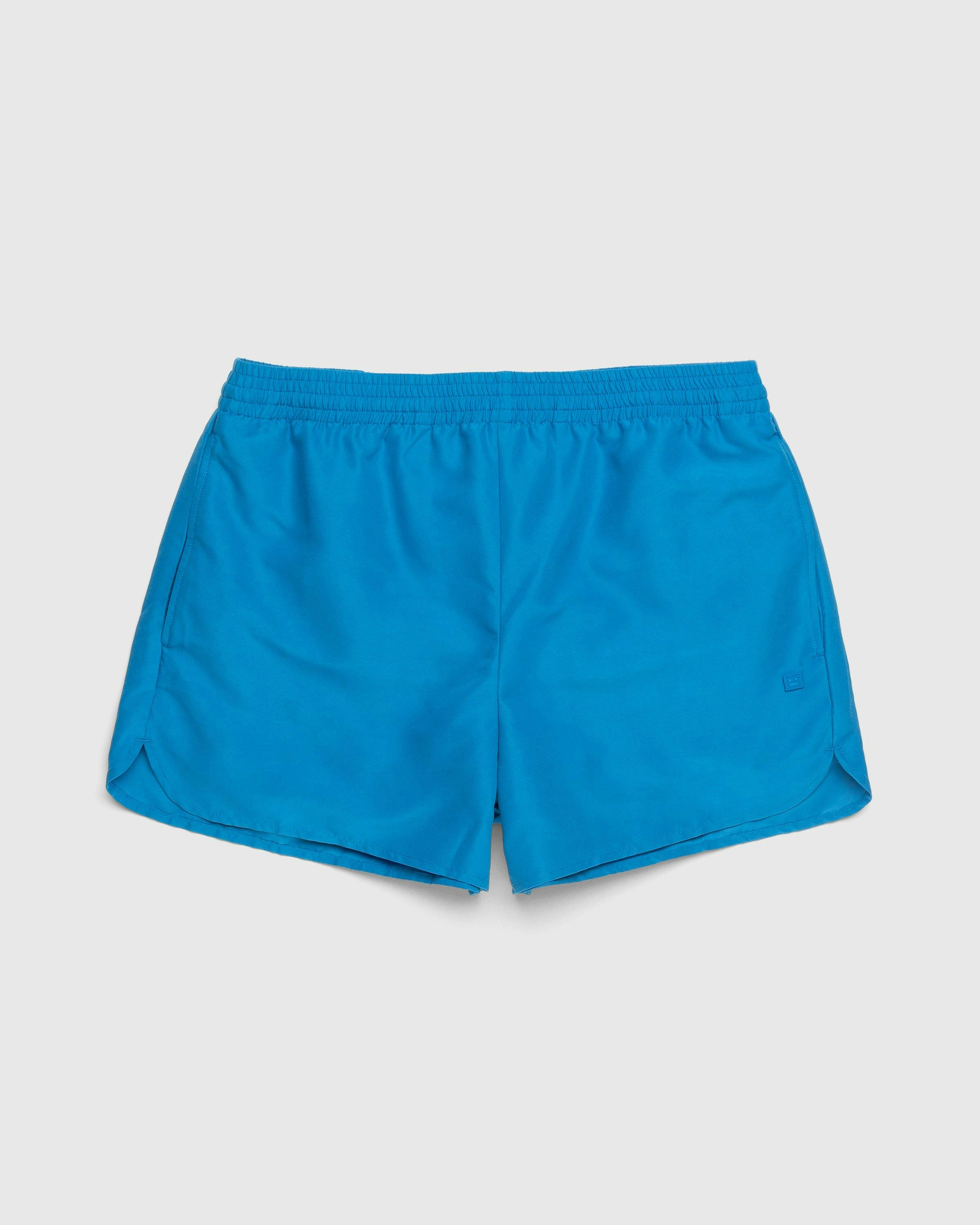 Acne Studios – Water Reactive Logo Swim Shorts Blue | Highsnobiety Shop