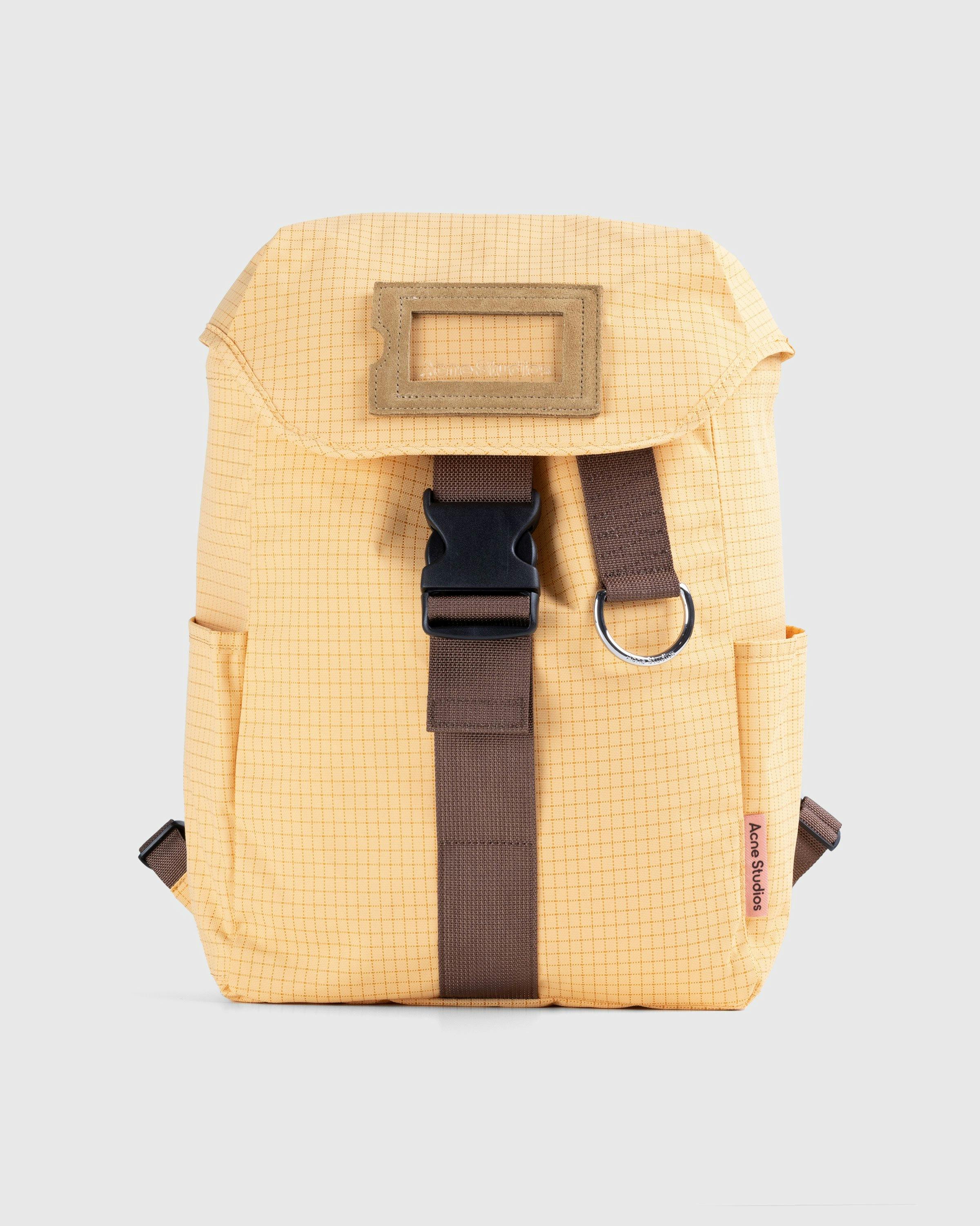 Acne Studios – Ripstop Nylon Backpack Yellow/Brown | Highsnobiety Shop