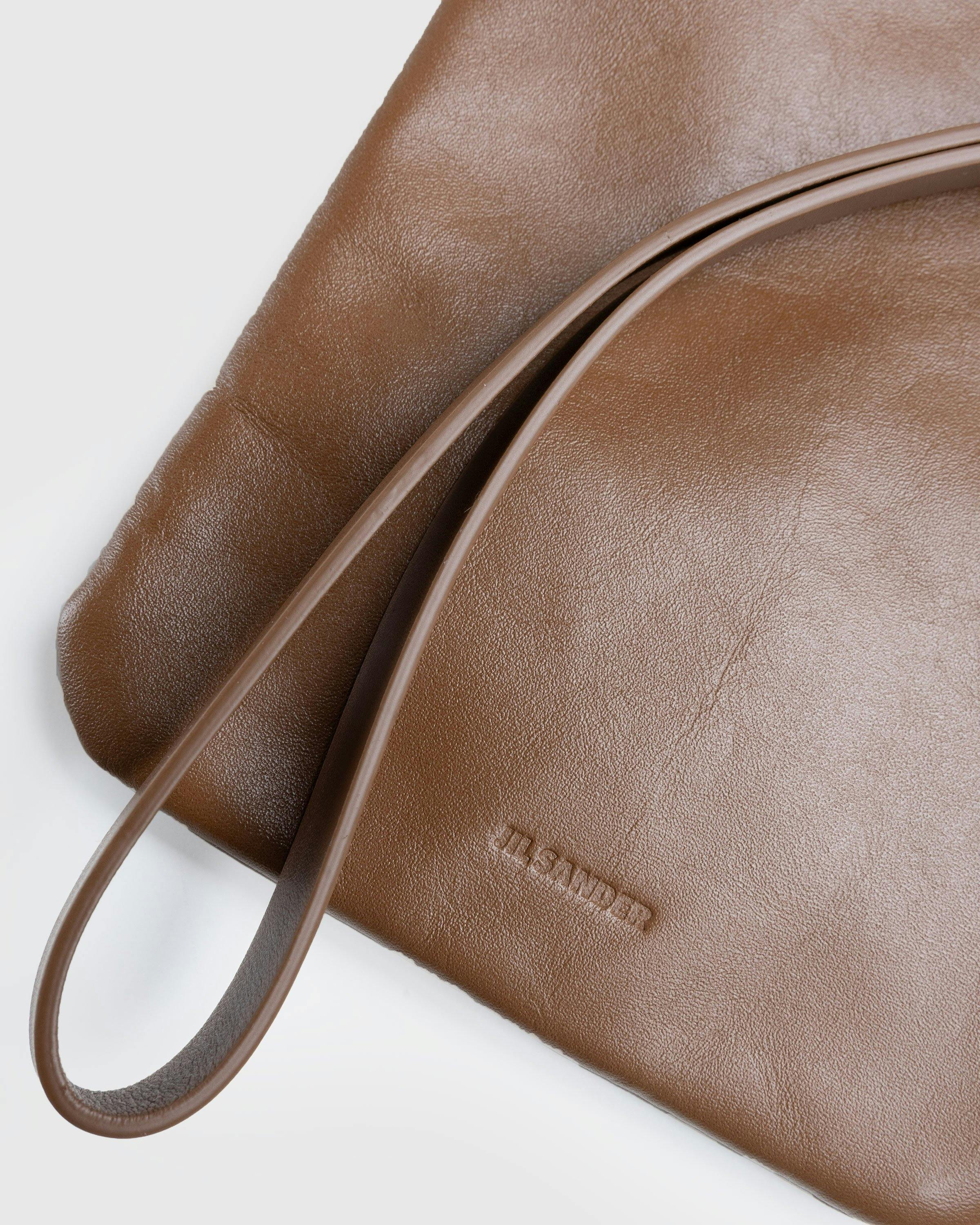 Jil Sander – Link Pouch Nether Red | Highsnobiety Shop