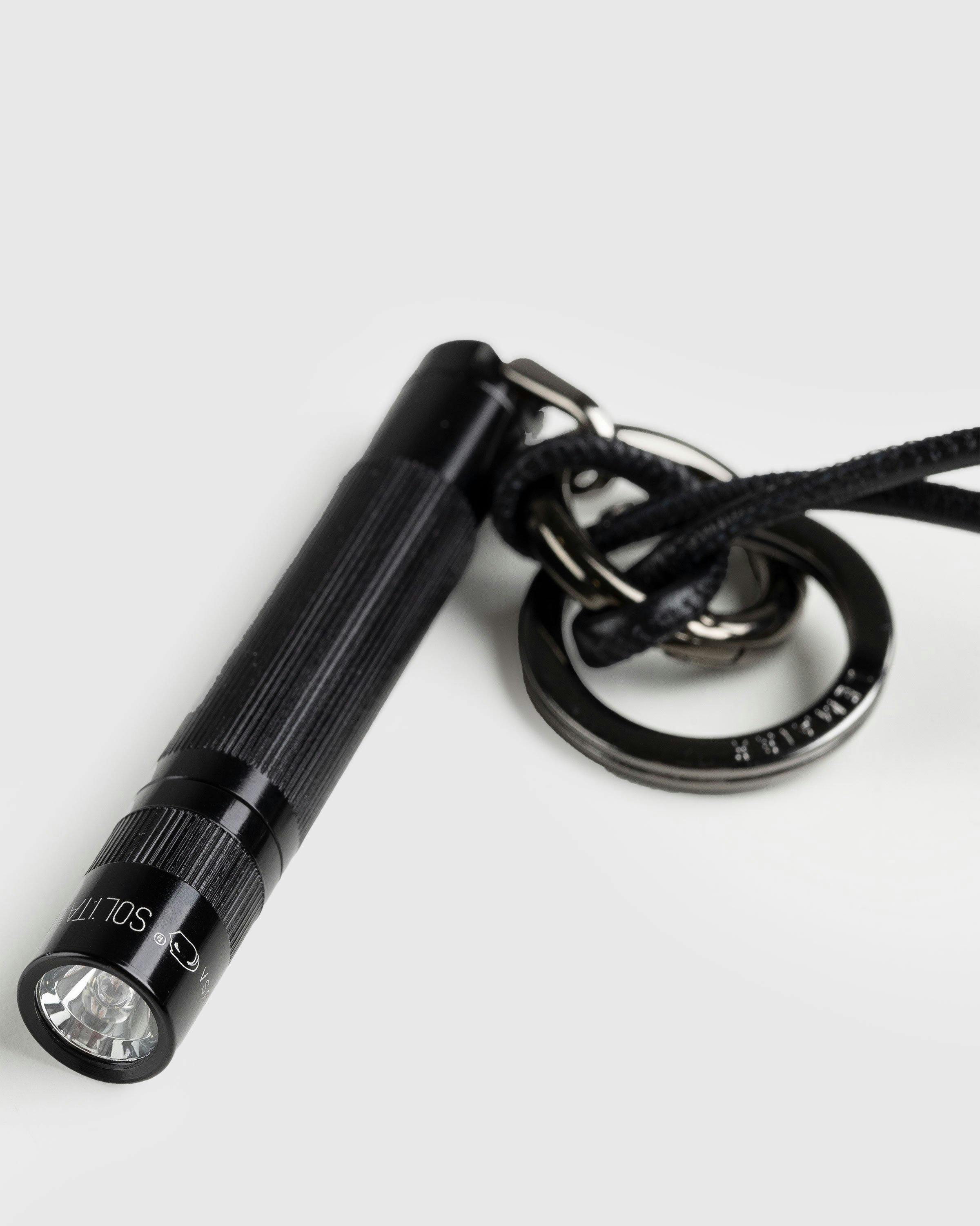 Lemaire – Maglite Leather Necklace Black | Highsnobiety Shop