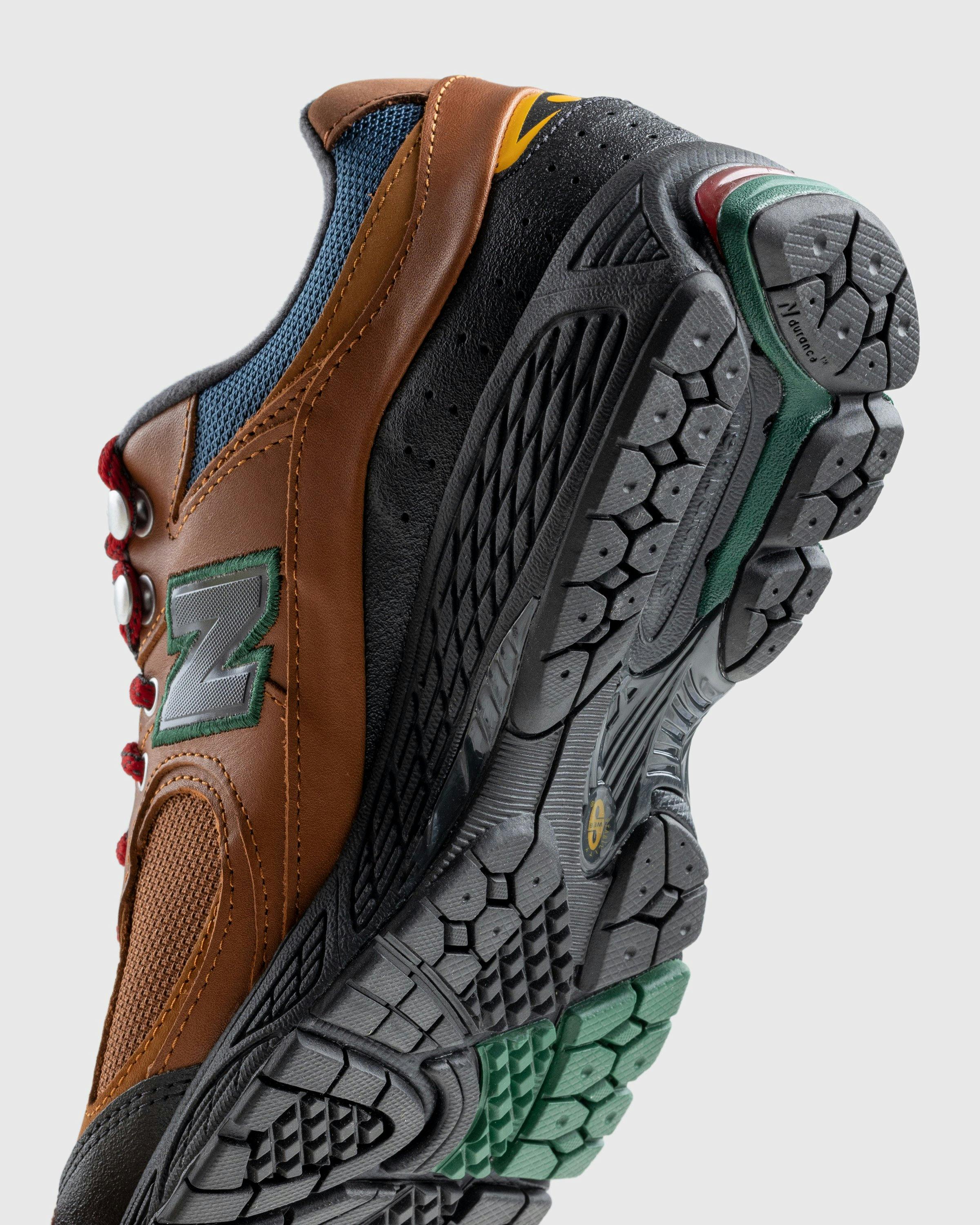 New Balance – M2002RWM Brown/Team Red | Highsnobiety Shop