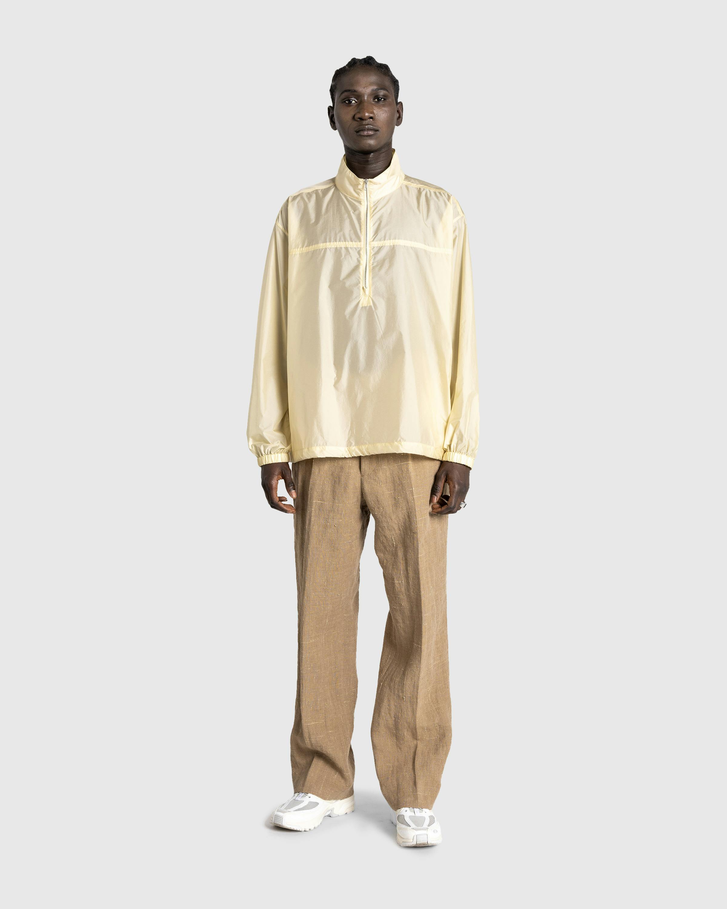 Auralee – Light Nylon Half Zip P/O Light Yellow | Highsnobiety Shop