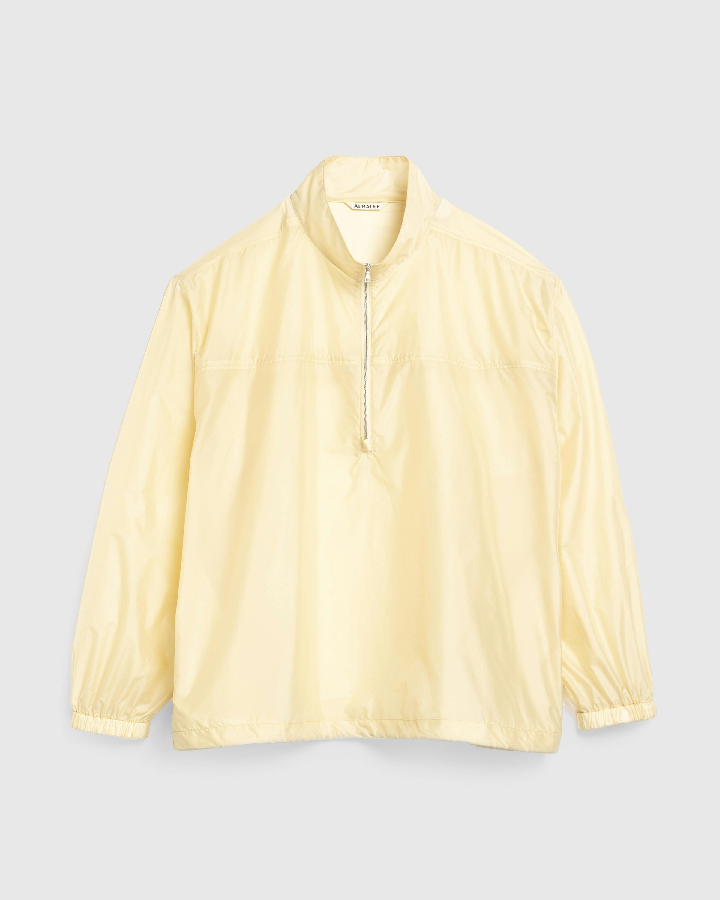 Auralee – Light Nylon Half Zip P/O Light Yellow | Highsnobiety Shop