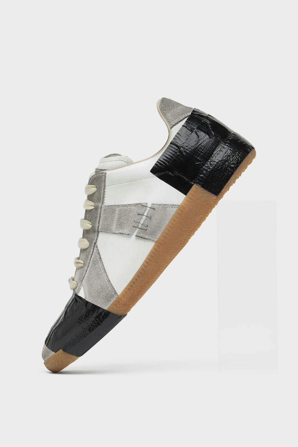 Margiela's Dirty Duct-Taped Replica Sneaker Is $900