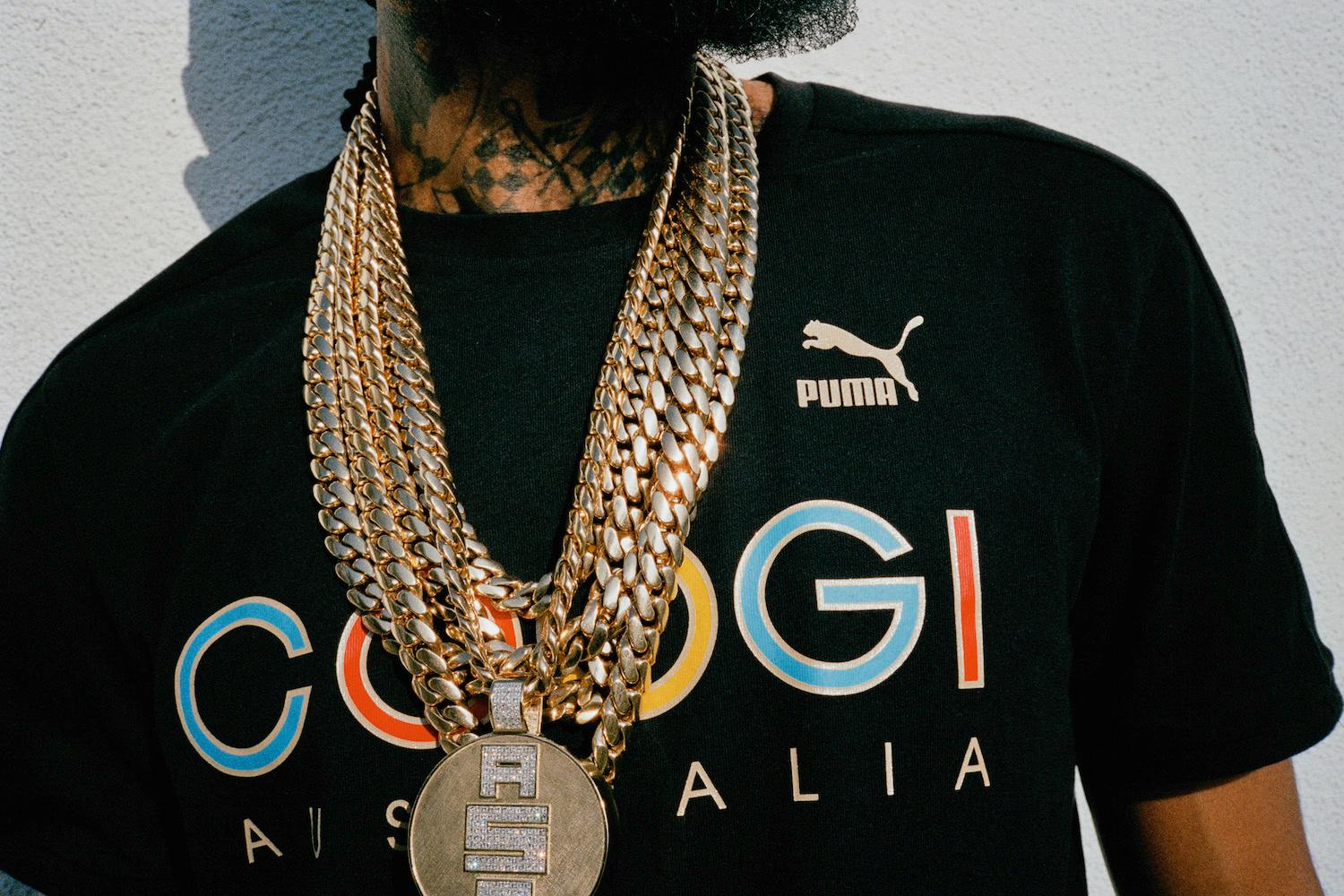 PUMA & COOGI Debut Colorful Authentic Tee on Nipsey Hussle