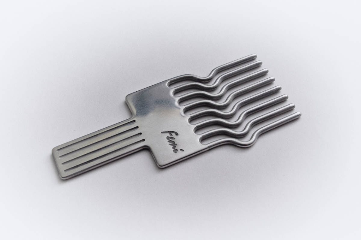 Simon Skinner's Handmade Afro Picks Interrogate Identity