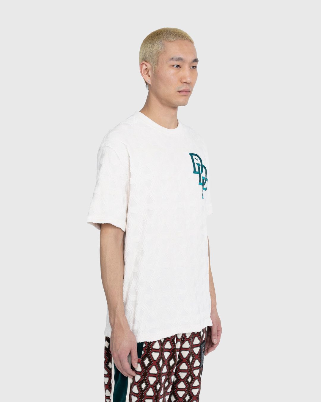 Puma x Dapper Dan – Jacquard Logo Tee Beige | Highsnobiety Shop
