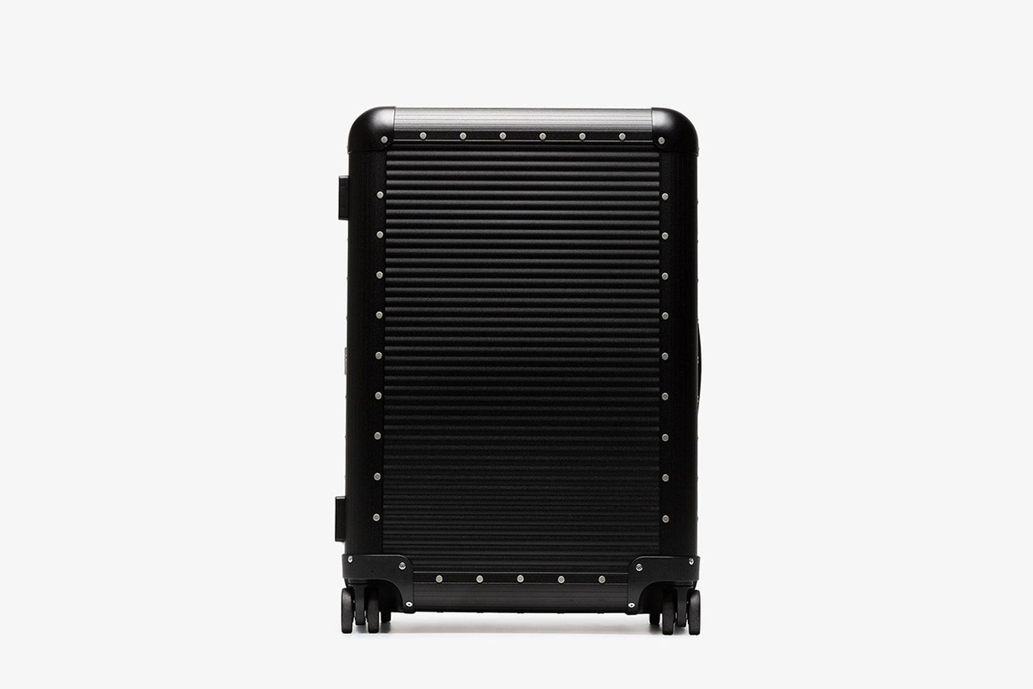 12 of the Best Designer Suitcases for First Class Travel Style