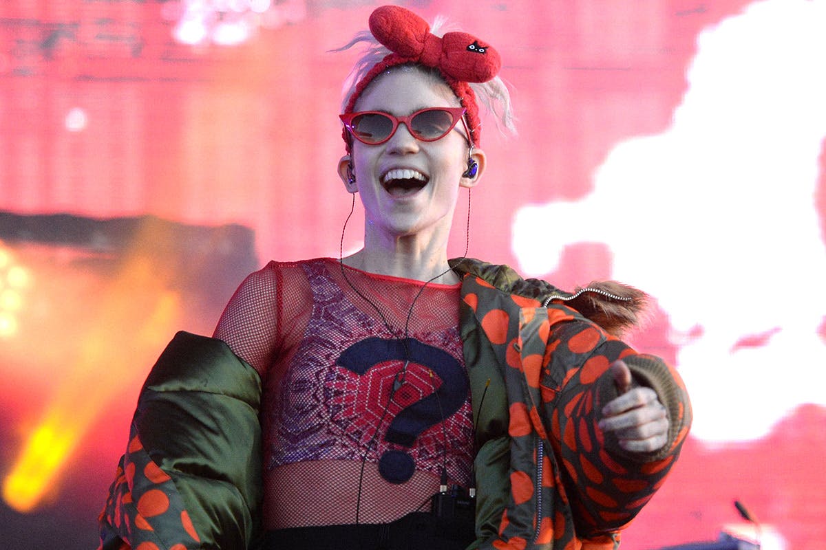 Grimes' Communist Manifesto Costume Is a Halloween Must