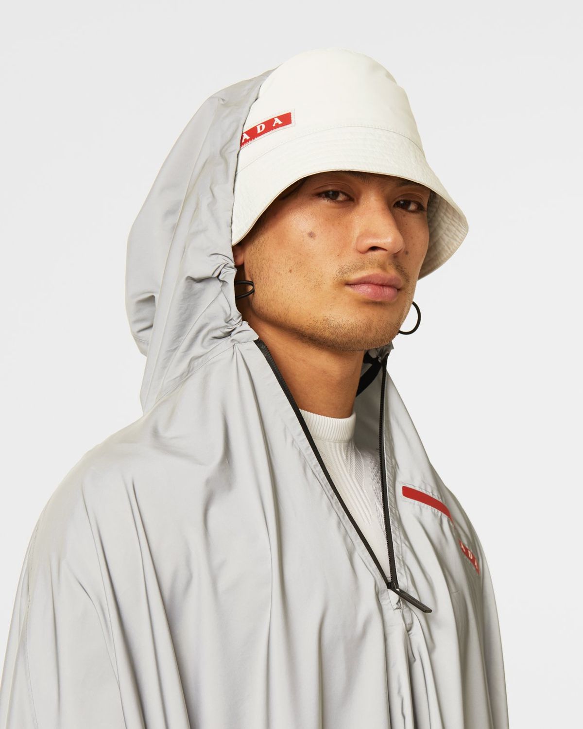 Prada – Reflective Poncho | Highsnobiety Shop