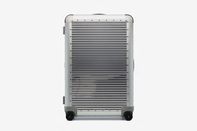 12 of the Best Designer Suitcases for First Class Travel Style